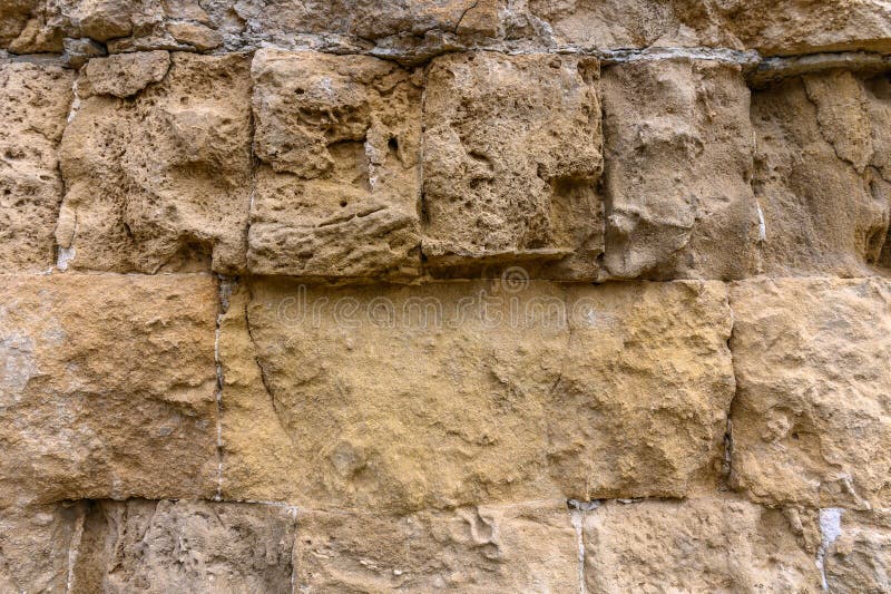 Texture of an Ancient Brick Wall Made of Sandstone. Archaeological ...