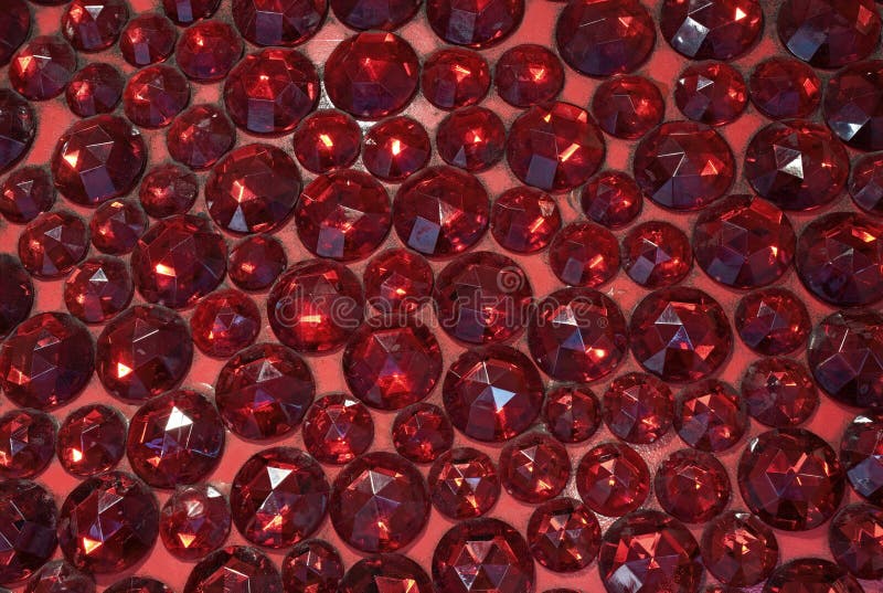 A Texture Background of Glittering Fake Red Ruby Gemstones Captured in ...