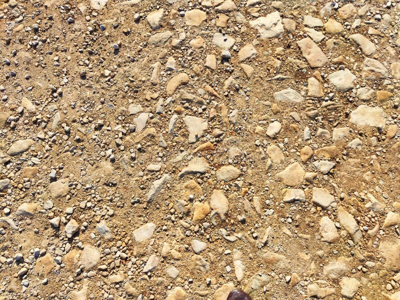 Texture and Background of Podzol Soil with Pebbles. Abstract Earth and ...
