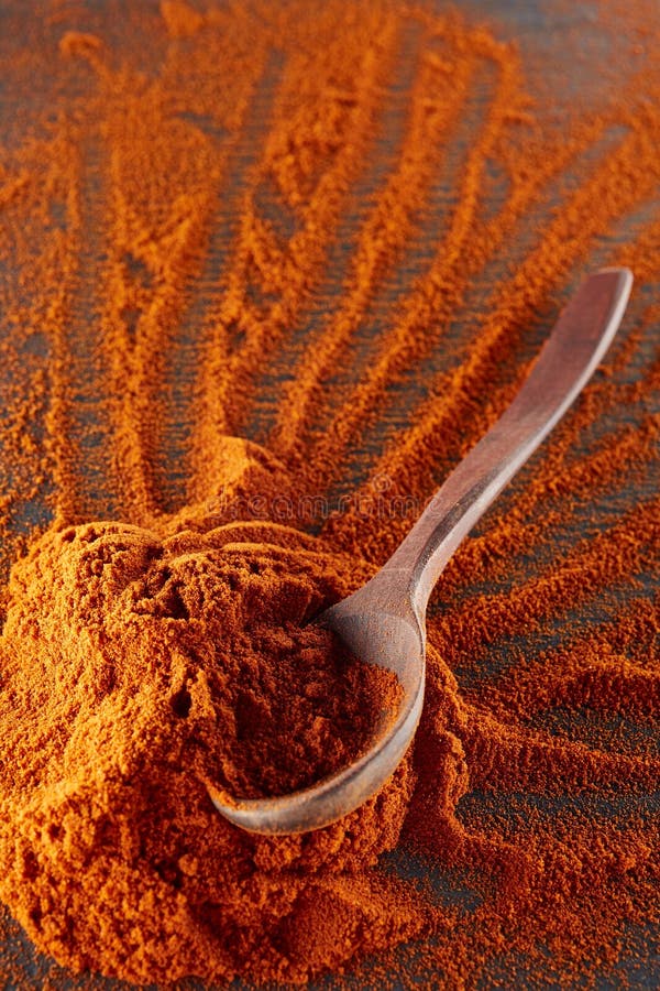 Texture Background. Red Chilli Pepper Powder Mixed with Wooden Spoon ...