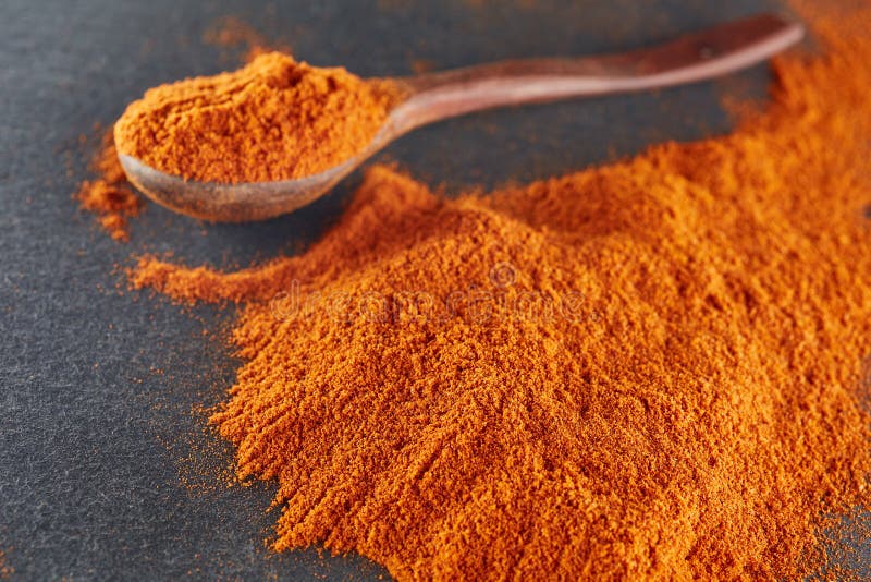 Texture Background. Red Chilli Pepper Powder Mixed with Wooden Spoon ...