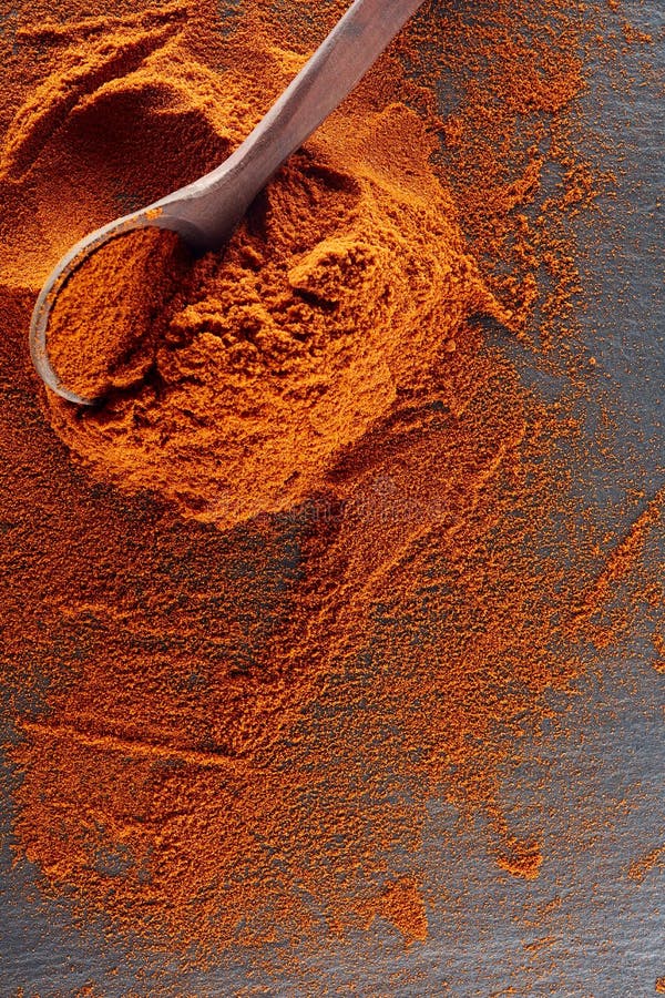 Texture Background. Red Chilli Pepper Powder Mixed with Wooden Spoon ...