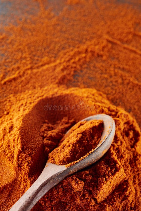 Texture Background. Red Chilli Pepper Powder Mixed with Wooden Spoon ...
