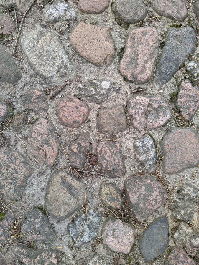 Texture and Background of Stones Rolled into the Ground Stock Image ...