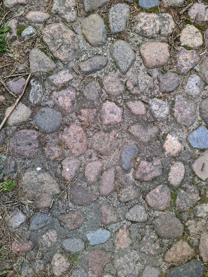Texture and Background of Stones Rolled into the Ground Stock Image ...