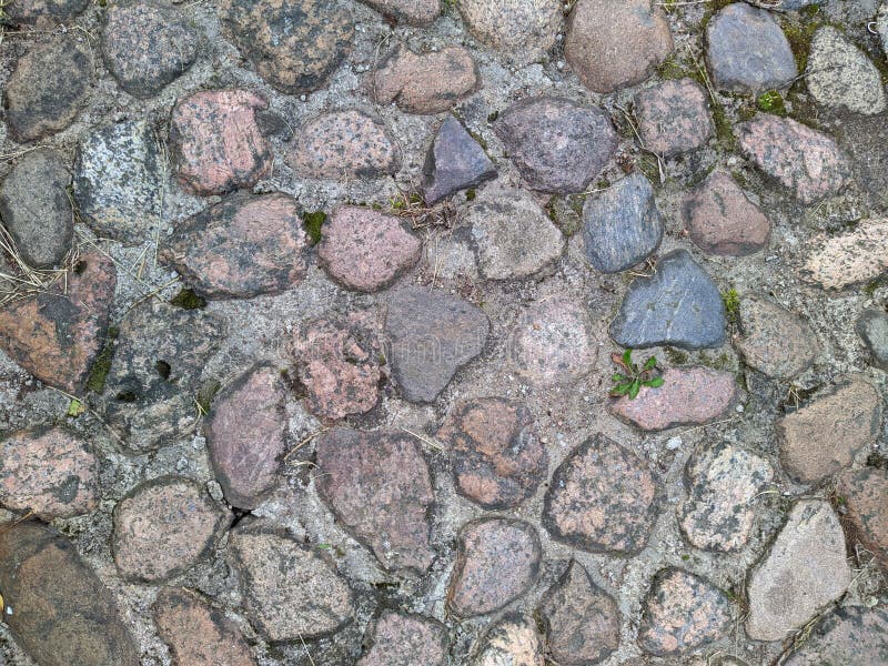 Texture and Background of Stones Rolled into the Ground Stock Photo ...