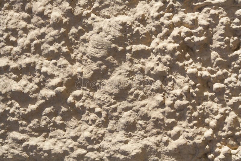 Texture of Beige Stone Wall with Rough Stucco Surface Stock Photo ...