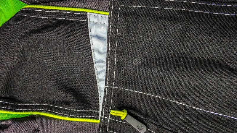Texture of a Black Work Uniform with Green Reflectors Close-up Stock ...