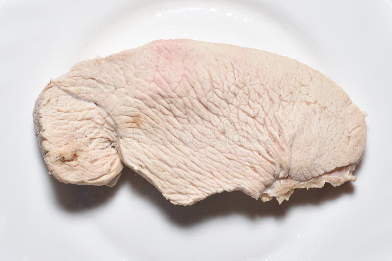 The Texture of Boiled Turkey Meat. Boiled Turkey Meat on a Plate Stock ...