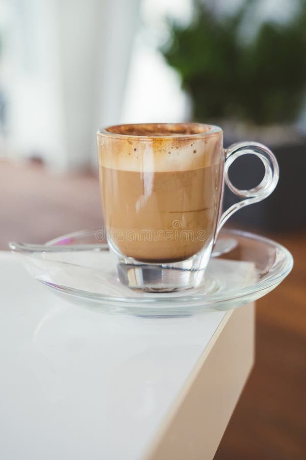 Texture of Capuccino Coffee on a White Table. Front View Stock Photo ...