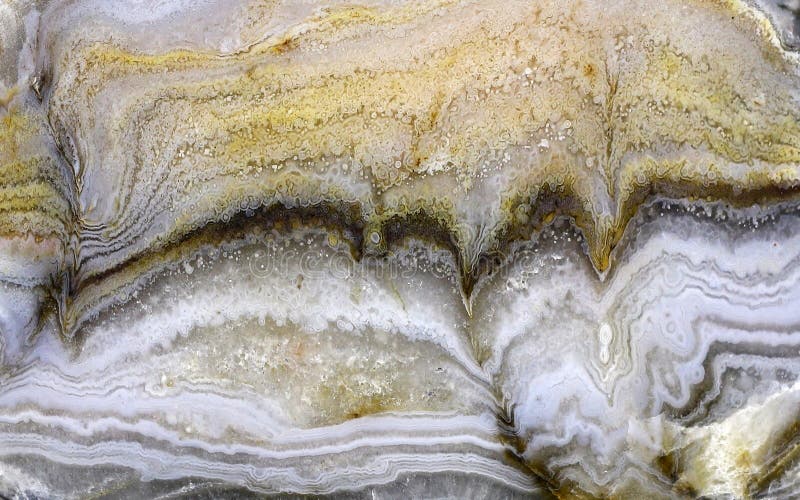 Texture of a Colorful Natural Stone with Layer Structure As a ...