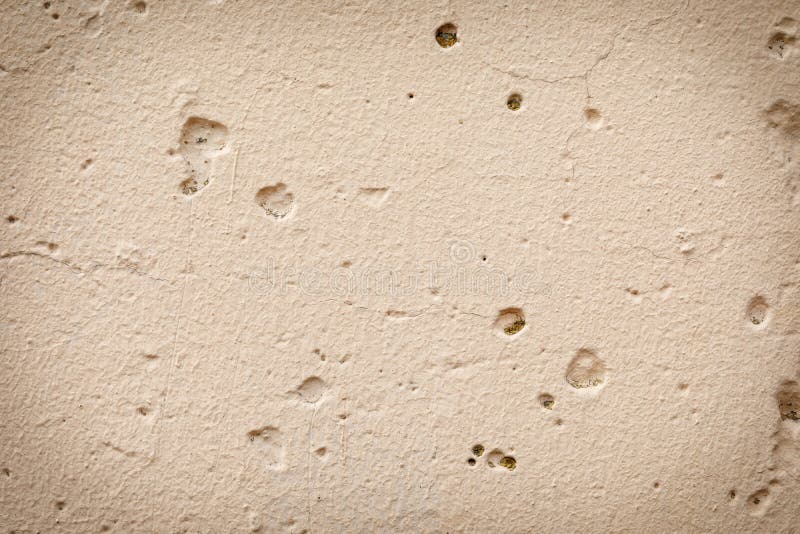 Texture of a Concrete Beige, Wall with Bumps, Cracks, Splashes ...