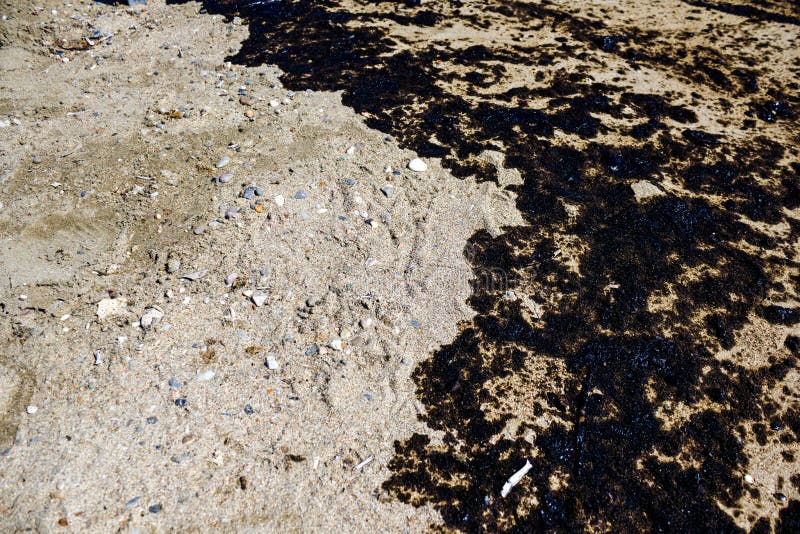 Texture Of Crude Oil Spill On Sand Beach From Oil Spill Accident Agios