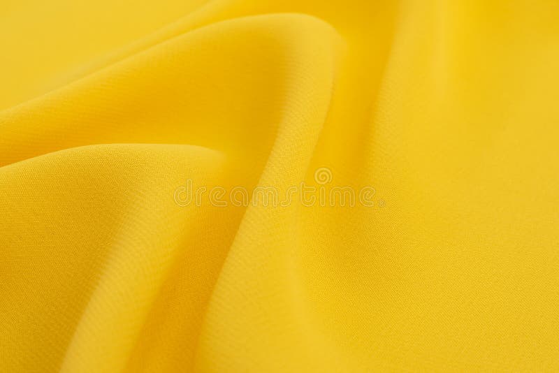 Texture of Crumpled Yellow Fabric. Background of Luxury Textile or ...