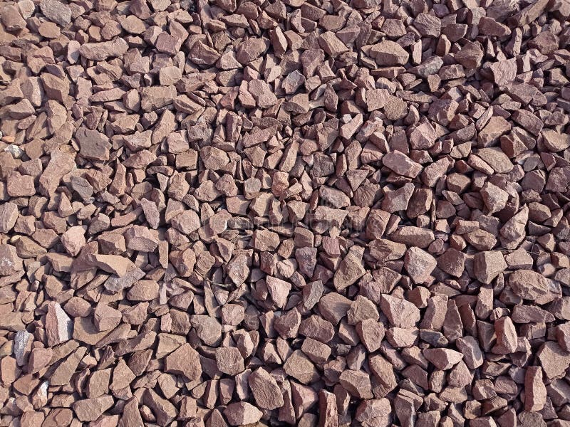 Texture Crushed Stone with a Red Hue in the Side Light Stock Image ...