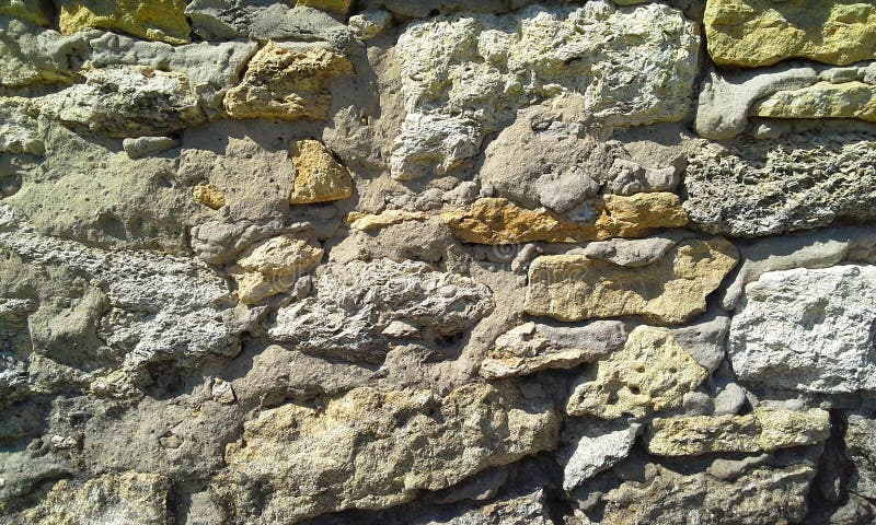 Texture de mur de roches photo stock. Image du conception - 123561592