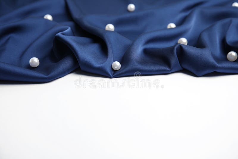 Texture of Delicate Dark Blue Silk with Pearls on White Background ...