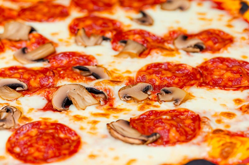 The Texture of a Delicious Italian Pizza with Cheese and Spices Stock ...