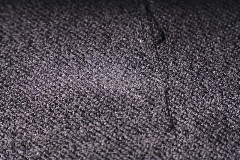 The Texture of a Dense Dark Fabric with a Protruding Thread Stock Photo ...