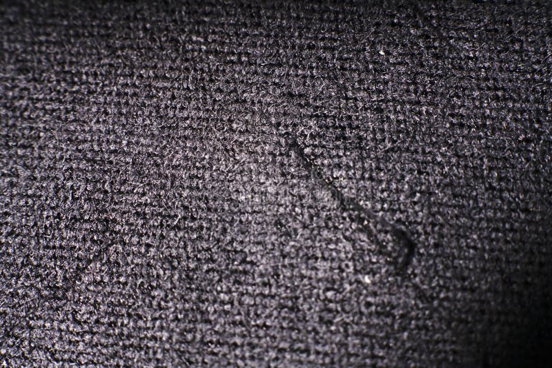 The Texture of a Dense Dark Fabric with a Protruding Thread Stock Photo ...