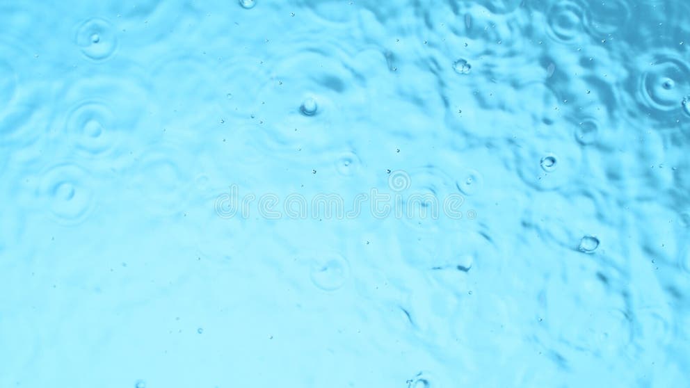 Texture of Dropping Water Drops on Surface, Overhead Shot Stock Photo ...