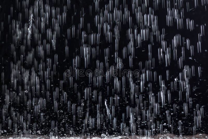 Texture of Falling Night Rain Drops with Splashes on the Surface of the ...