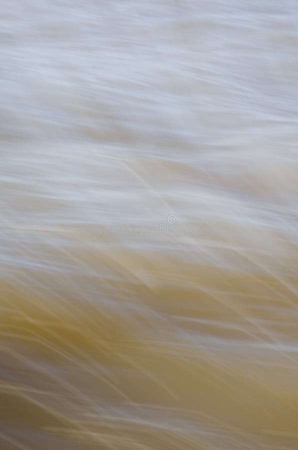 Texture of Fast Moving Water, in Yellowish Soft Tones Stock Image ...