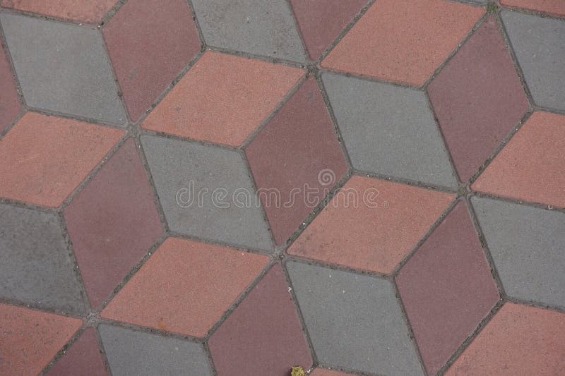 Geometric Pavement Made of Grey, Coral and Maroon Concrete Tiles Stock ...