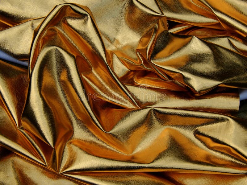 Golden material folds stock photo. Image of glossy, closeup - 32325286