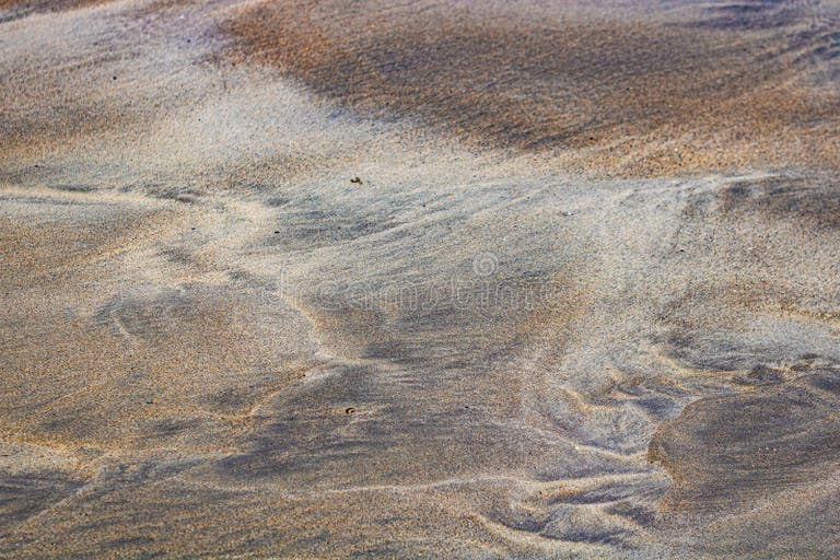 Texture of Golden Sand with Wave Pattern Left after Low Tide Stock ...