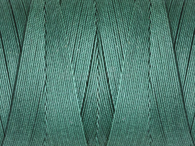 Green sewing thread stock image. Image of clothing, closeup - 13581697
