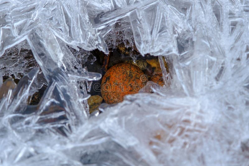 Texture Ice Cracks, White Ice Crystals, Winter Frost Background. a Red ...