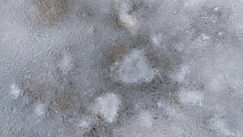 Texture of Ice in a Pond, and a Frozen Tree Leaf Stock Photo - Image of ...
