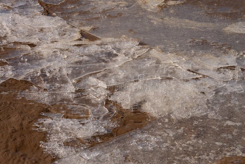 The texture of ice on sand stock image. Image of beach - 217112859