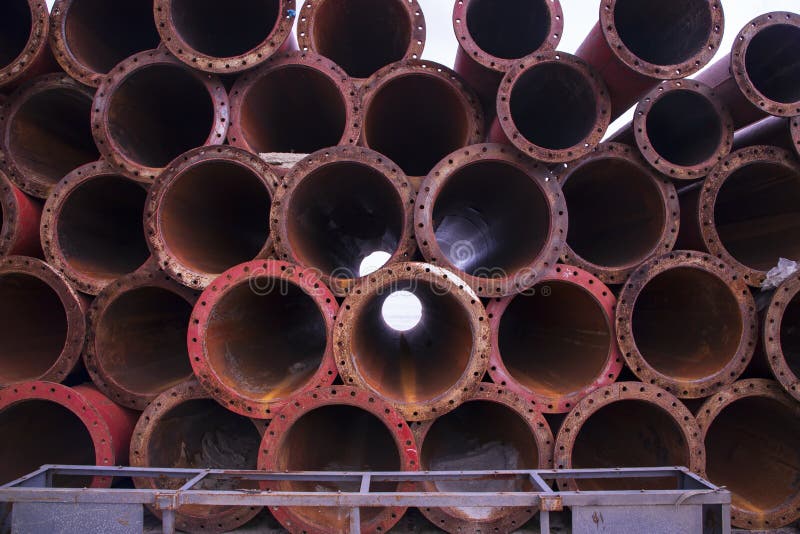 A Texture Industrial Background of Rusty Iron Pipes Stack Stock Photo ...