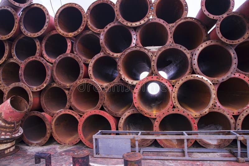 A Texture Industrial Background of Rusty Iron Pipes Stack Stock Photo ...
