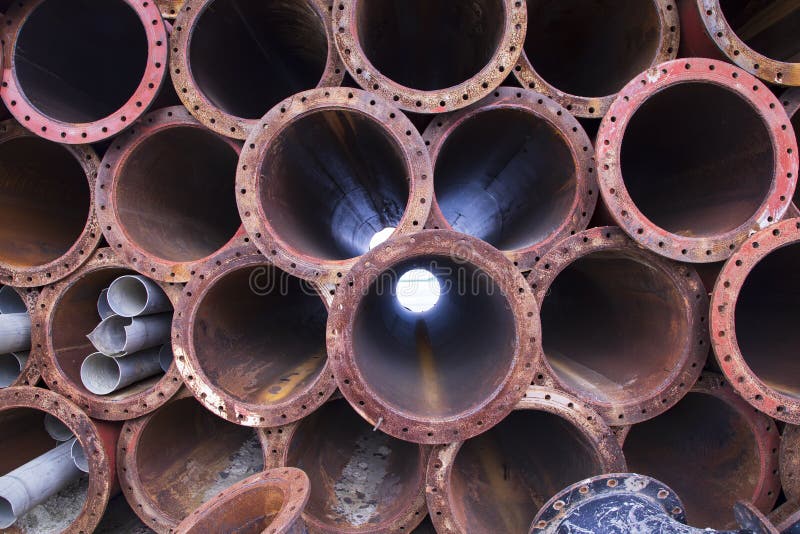 A Texture Industrial Background of Rusty Iron Pipes Stack Stock Image ...