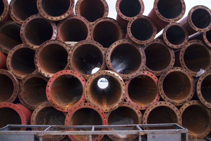 A Texture Industrial Background of Rusty Iron Pipes Stack Stock Photo ...