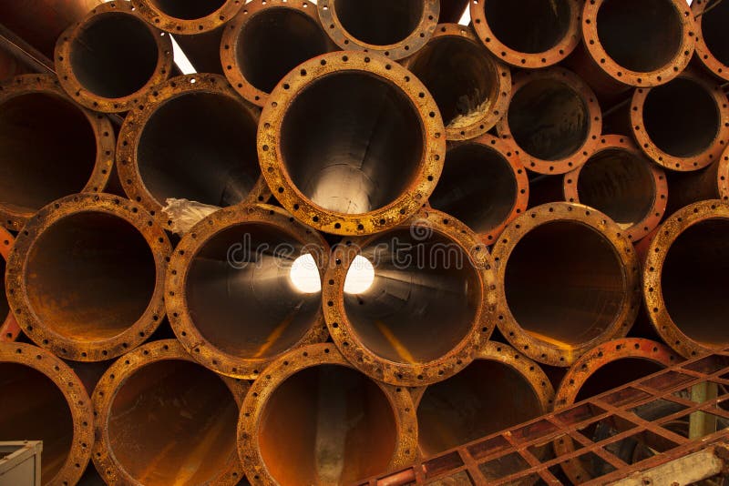 A Texture Industrial Background of Rusty Iron Pipes Stack Stock Photo ...