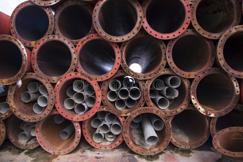 A Texture Industrial Background of Rusty Iron Pipes Stack Stock Image ...