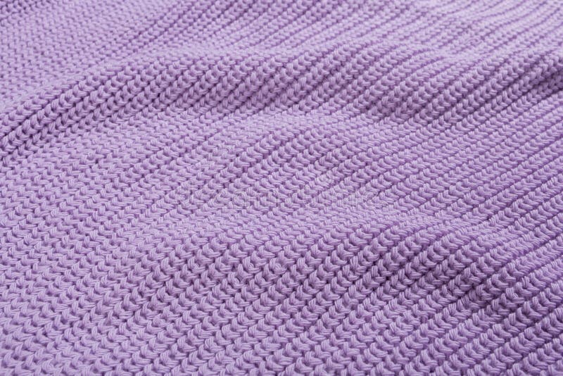 The Texture of a Lilac Knitted Fabric, Close-up, Fabric with Folds ...