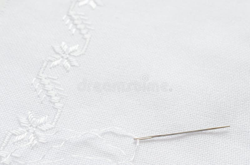 Texture of Linen Fabric with White Silk Embroidery Stock Photo - Image ...