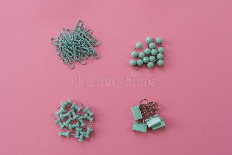 Texture Made of Paper Clips and Push Pins on a Pink Pastel Background ...