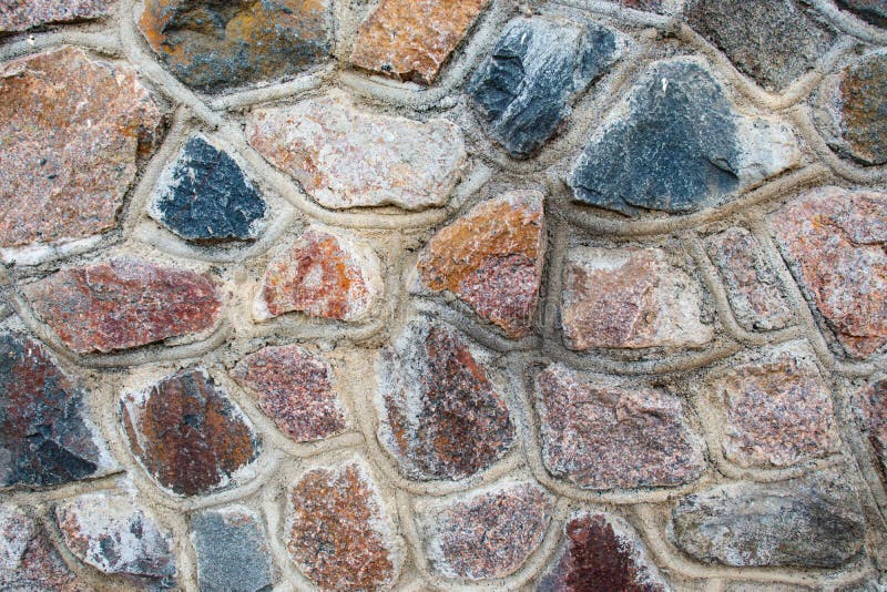 The Texture of Masonry is Made of Multi-colored Stones Connected with ...