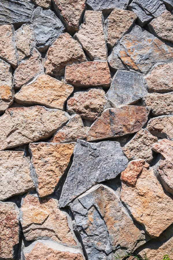 Texture of Masonry of a Modern Stone Wall Made of Multicolored Stones ...