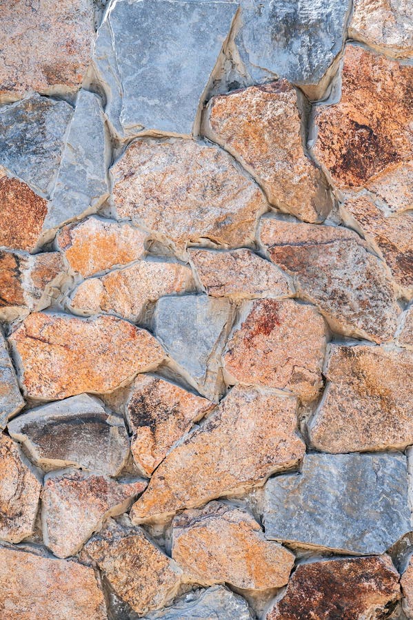 Texture of Masonry of a Modern Stone Wall Made of Multicolored Stones ...