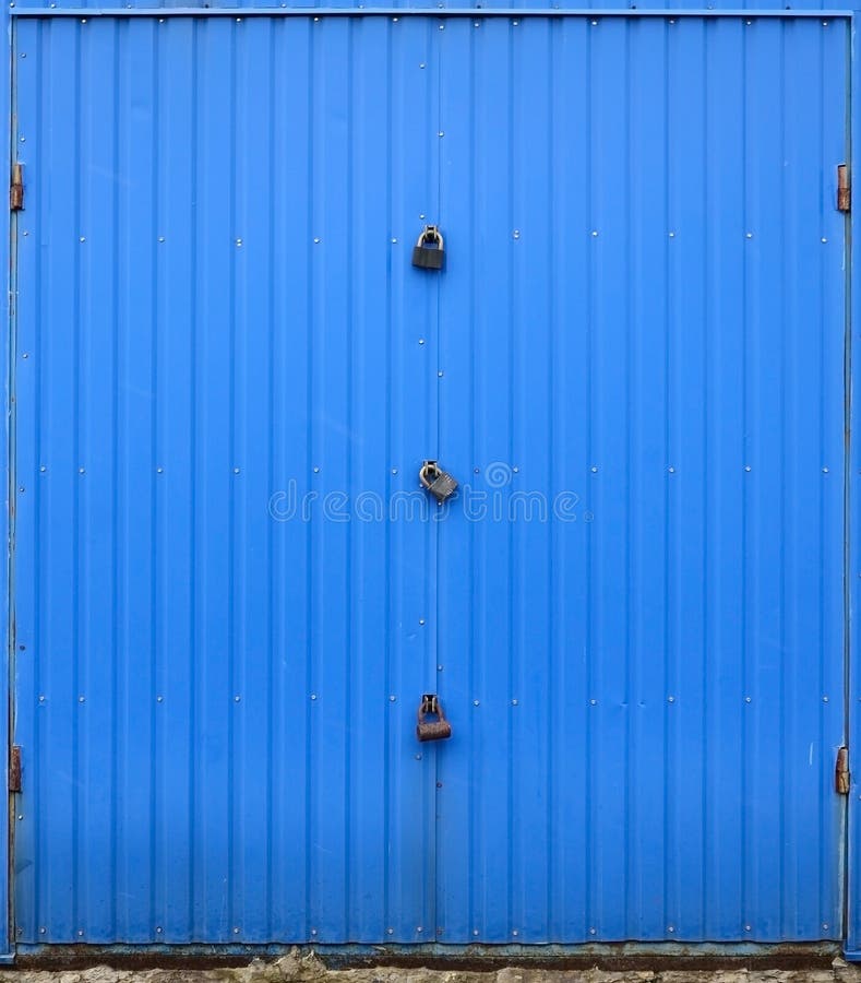 Texture of a Metal Blue Wall with a Gate Closed for Three Locks Stock ...