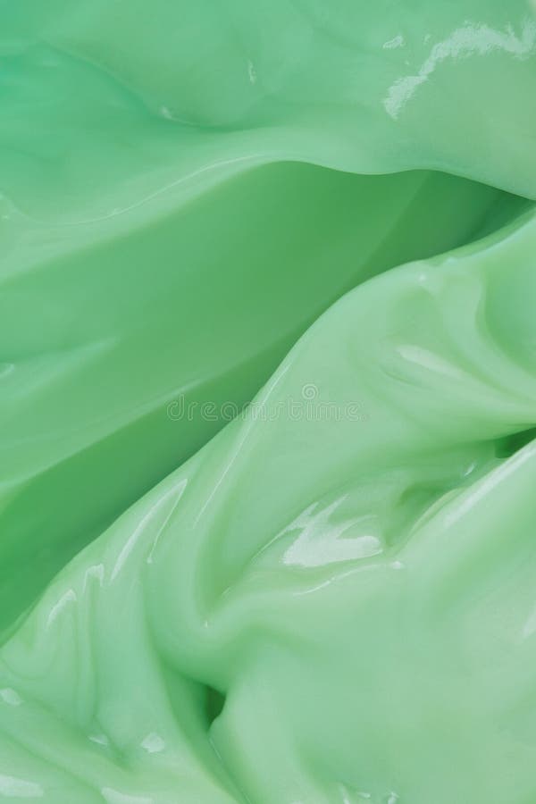 The Texture of a Moisturizing Body Cream. Green Liquid Texture Waves ...