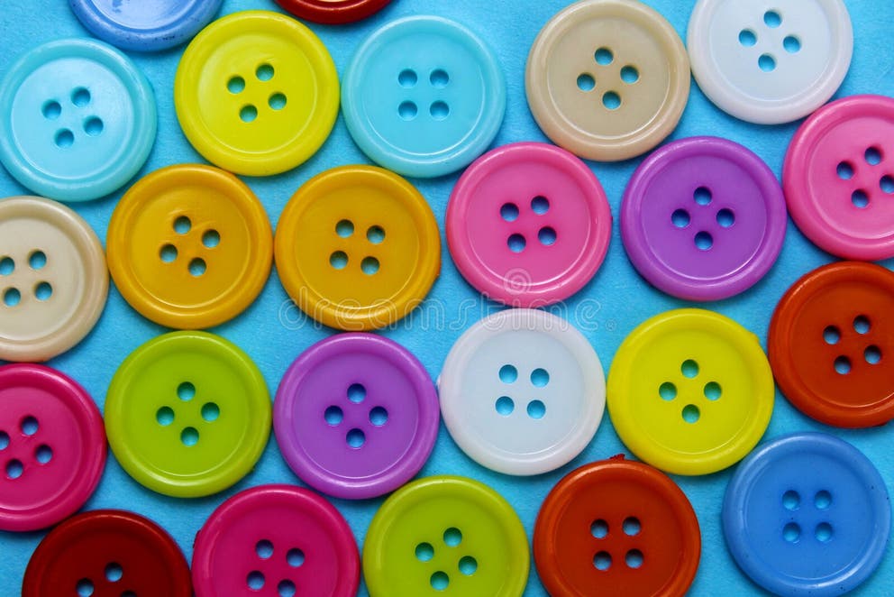 Texture of Multi-colored Buttons Laid Out on a Blue Surface Stock Image ...