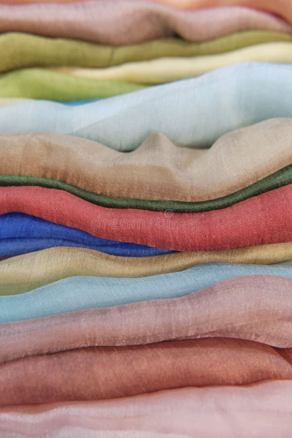 Multi-colored Monochromatic Silk Soft Fabrics Stacked Horizontally ...
